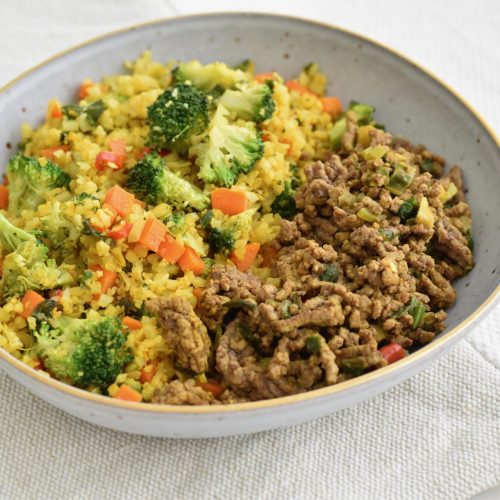 Garlic Ginger Beef Bowl with Cauliflower "Fried" Rice - Glow by Marlowe